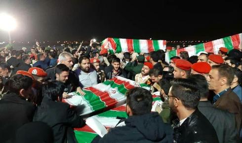 Soleimani's body arrives in Iran as Trump issues new threats