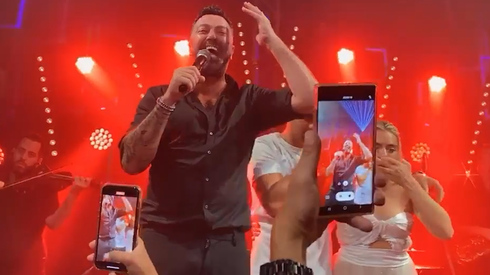 Israeli pop star sings at illegal wedding attended by hundreds