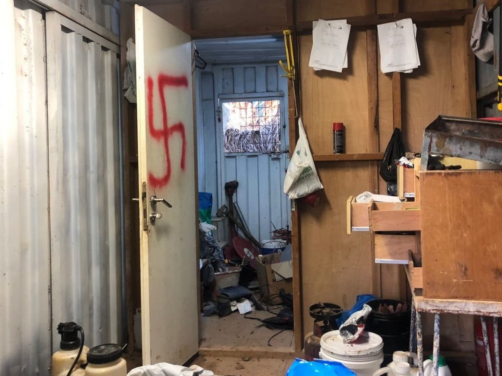 Israeli farmer finds swastika painted on storage unit