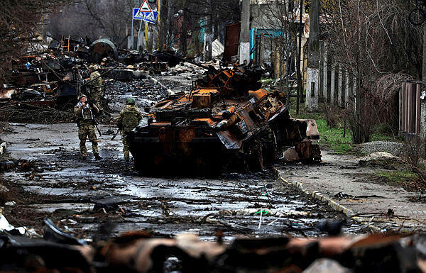 Lapid condemns carnage in Ukraine town as 'war crime'