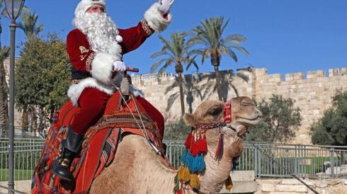 Palestinian Santa brings festive cheer to Jerusalem