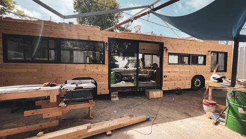 Israeli designer turns bus into savvy tiny house