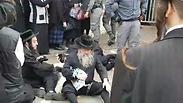 Haredim clash with police outside IDF induction center in Jerusalem