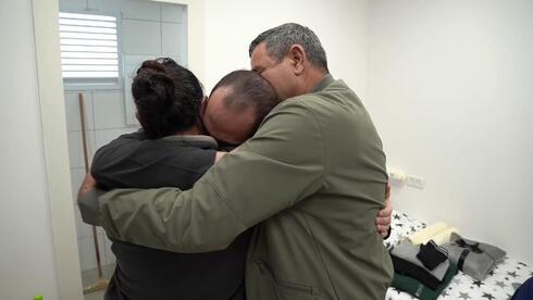 Tears of joy: Ofer sees his kids, Yarden hugs his father and Keith ...