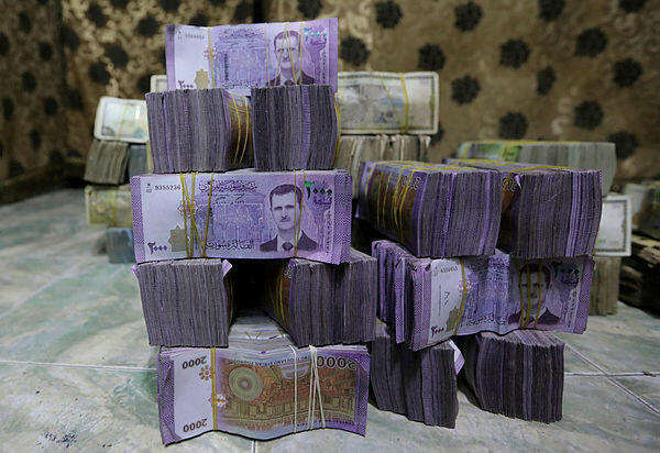 No more Assad on the money: Syria phases out old currency in symbolic move