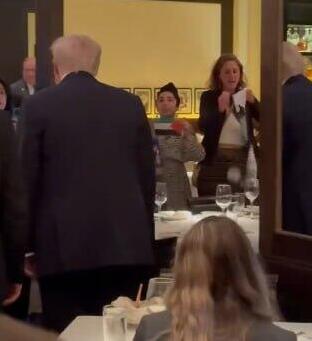 Protesters confront Trump in DC restaurant: 'Hitler of our time, Free ...