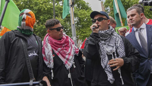 UK appeals dismissal of terror charge against Kneecap rapper who waved ...