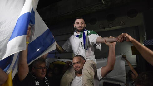 Hero's welcome: Freed hostage Matan Angrest returns home after rehab