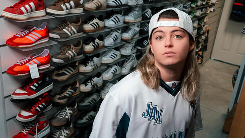 Inside Dylen Dror's custom closet: viral teen who built a store-style wardrobe wall